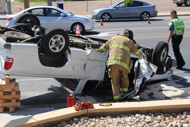 Man in critical condition after collision, rollover in downtown ...