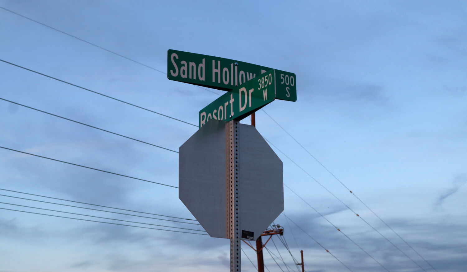 Rollover crash off Sand Hollow Road launches dust cloud across ...
