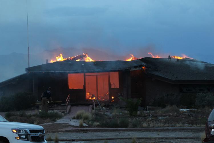 Front-end loader extinguishes fire at abandoned visitor center | Local ...