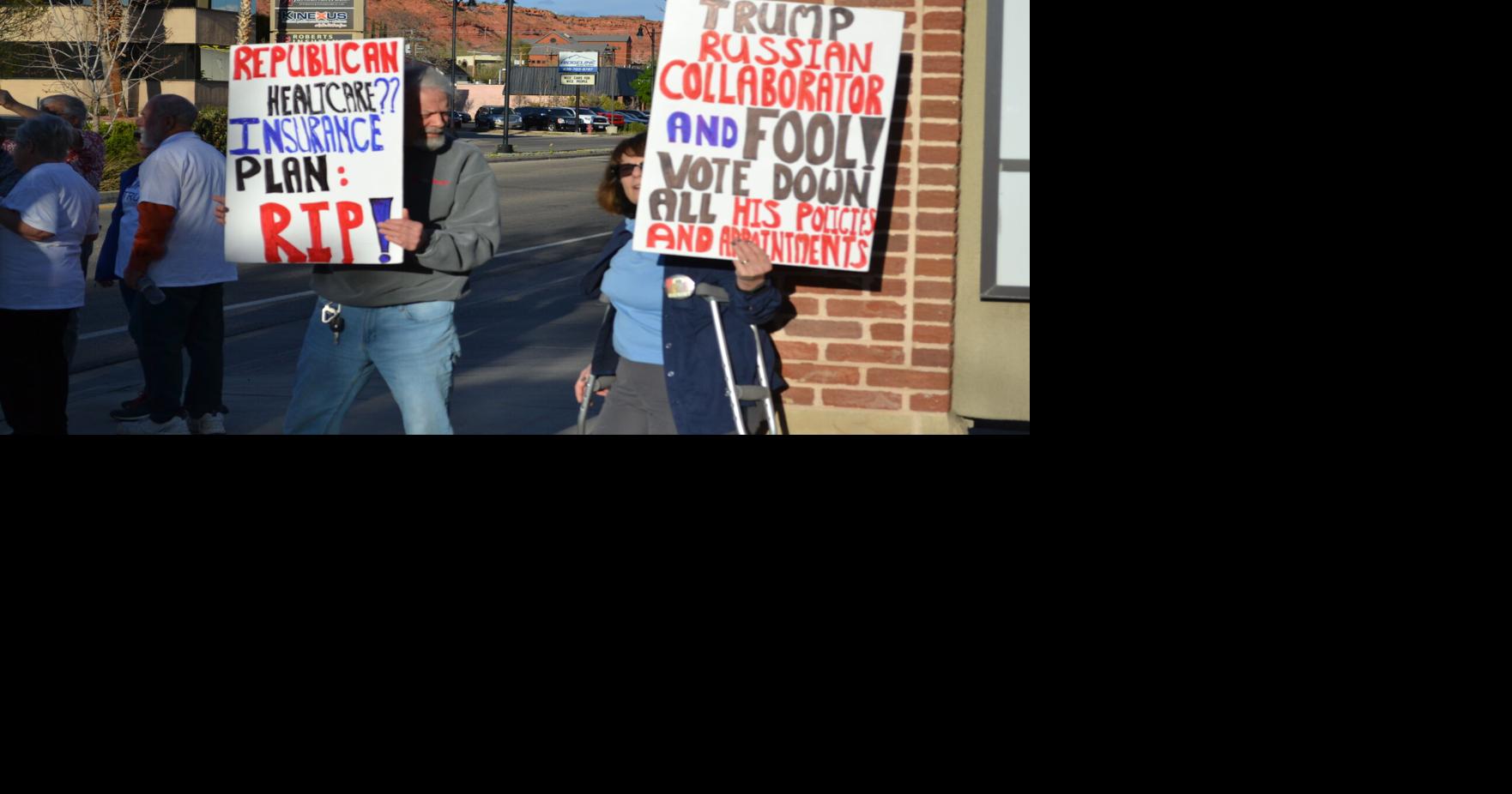 Protesters in downtown St. George demand release of Mueller report ...