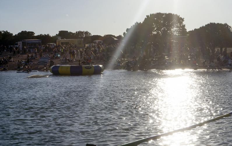 ‘A beautiful night’: Hopes and wishes set sail on candlelit lake at ...