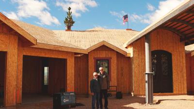 Builders host ‘topping out’ ceremony for luxury home under construction ...