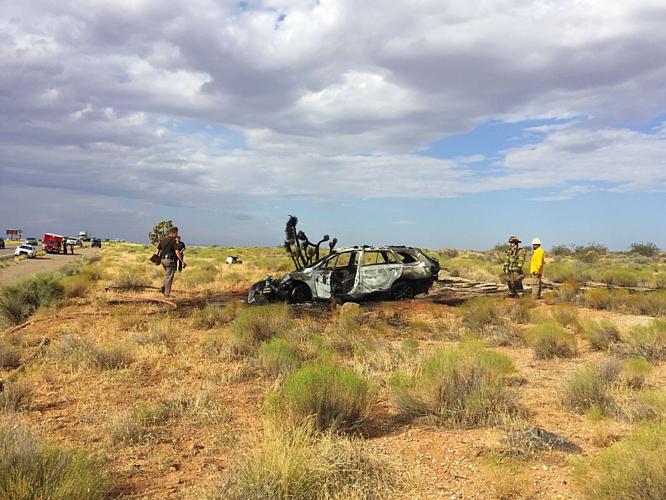 Car rolls, bursts into flames after SUV forces it off I-15 | Local News ...