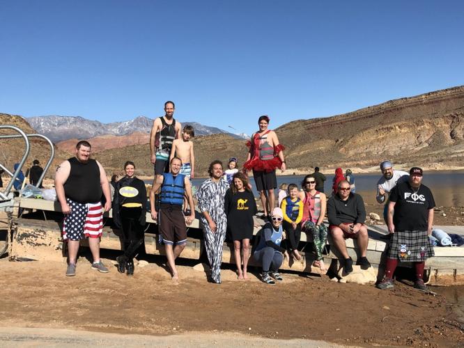 Kids, adults plunge into Quail Creek Reservoir to start 2021, benefit ...
