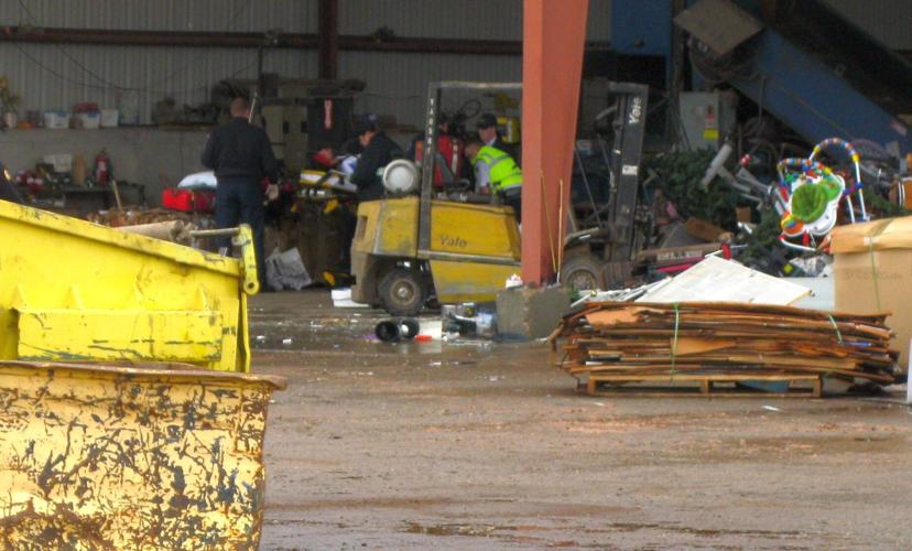 Recycling worker transported to hospital after getting leg caught in ...