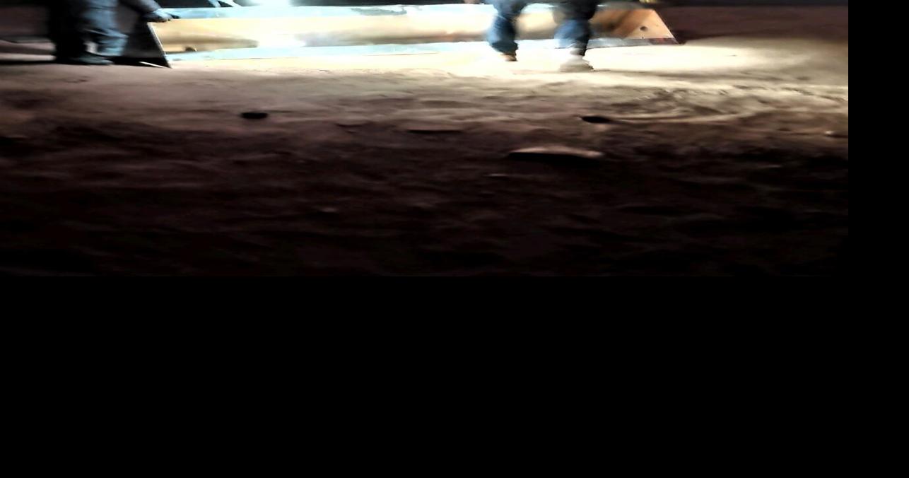 Photographer says he saw men remove mysterious metal object from ...