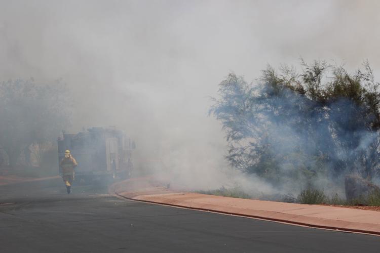 Fire crews attack blaze threatening homes | Flood And Fire ...