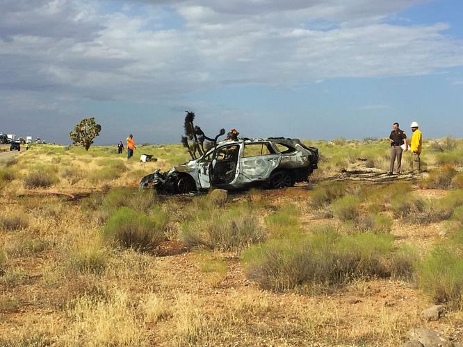 Car rolls, bursts into flames after SUV forces it off I-15 | Local News ...