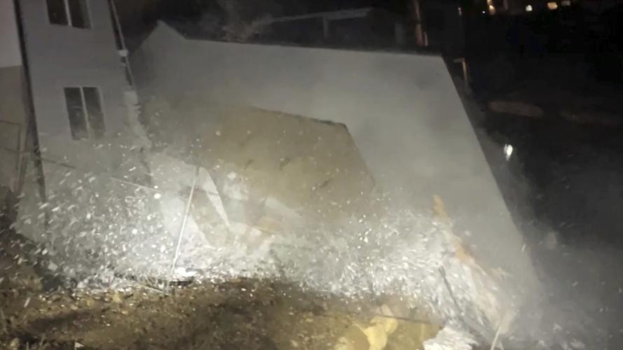 2 empty suburban Utah homes collapse down hill | Local News ...