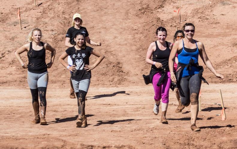 Hurricane Mud Run: 100s hit wet wet dirt, come out smiling; STGnews ...