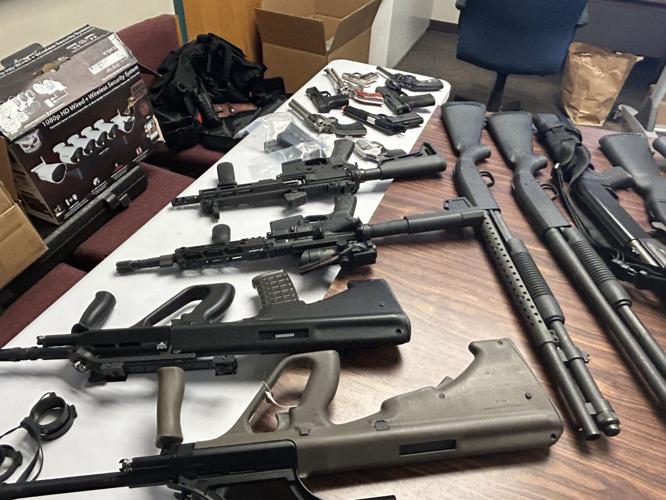 2 suspected drug dealers arrested in Cedar City raid; dozens of guns ...
