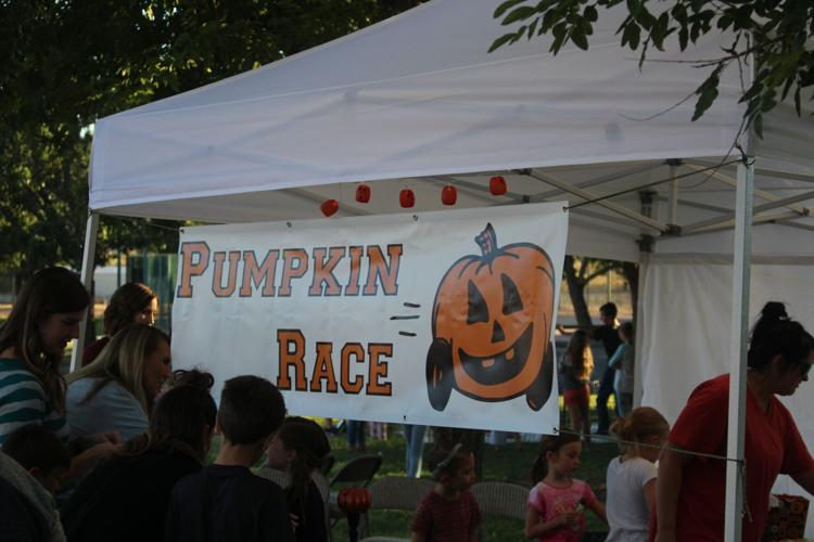 Families compete in Halloween pumpkin derby | News | stgeorgeutah.com