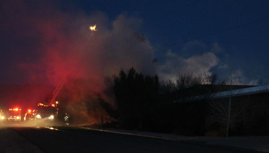 Officer sounds alert upon discovery of early morning blaze at Ivins ...