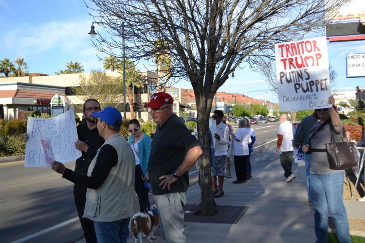 Protesters in downtown St. George demand release of Mueller report ...