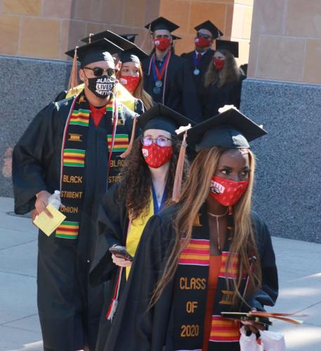 Mask-wearing graduates participate in SUU commencement, one of the few ...