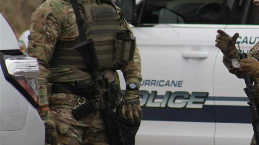 Man wanted on misdemeanor warrant surrenders to SWAT team after hiding ...