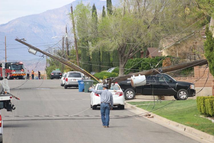 Downed power poles cause outage in Washington City | Local News ...