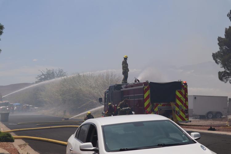 Multiple agencies respond to rapidly spreading brush fire that causes ...