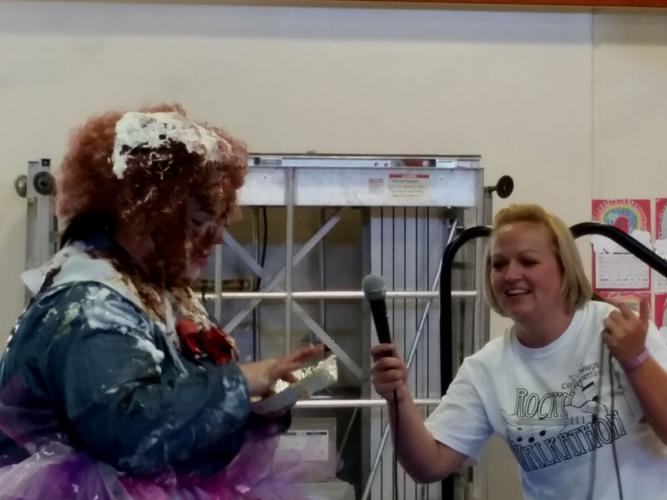 Turnabout is fair play: Students raise funds, get to throw pies at ...
