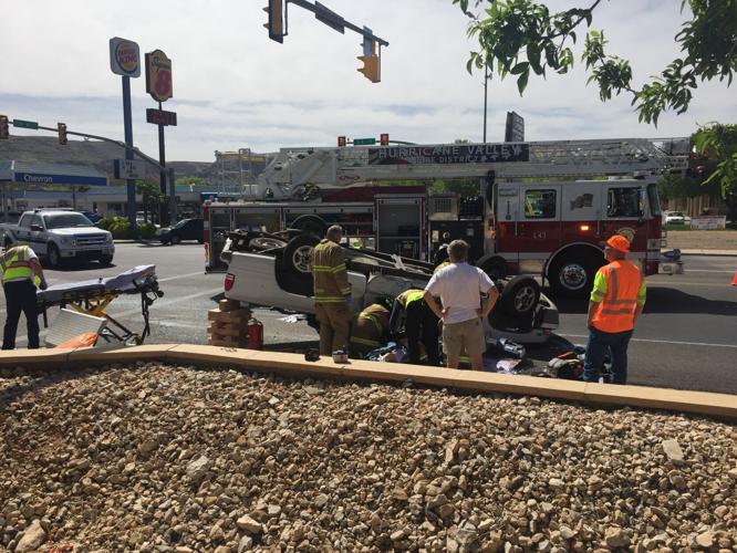 Man in critical condition after collision, rollover in downtown ...