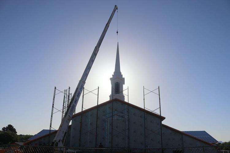 Months after fire, new steeple placed atop quickly rebuilt LDS stake ...