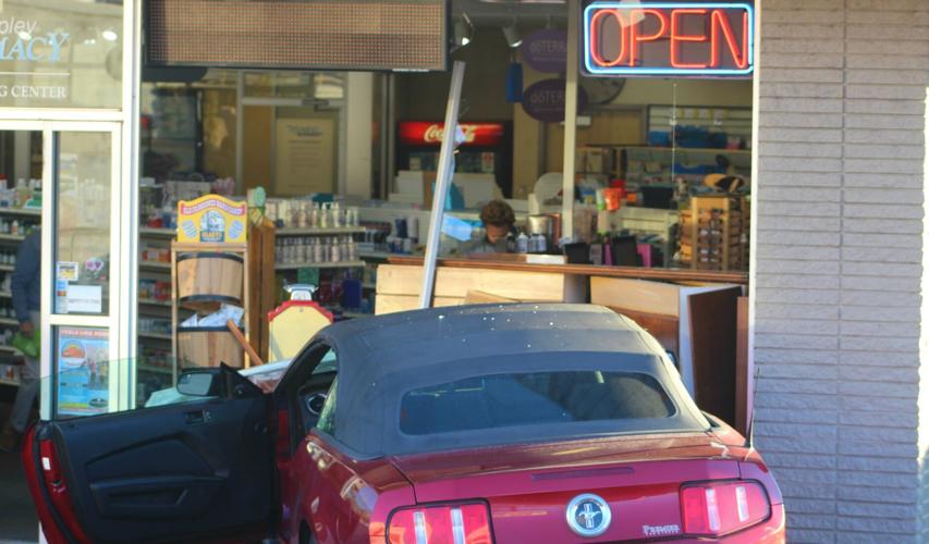 Mustang crashes into Stapley Pharmacy within feet of 3 employees ...