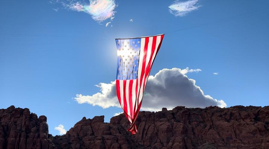 Flag weighing over 400 pounds flies high over Snow Canyon ahead of ...