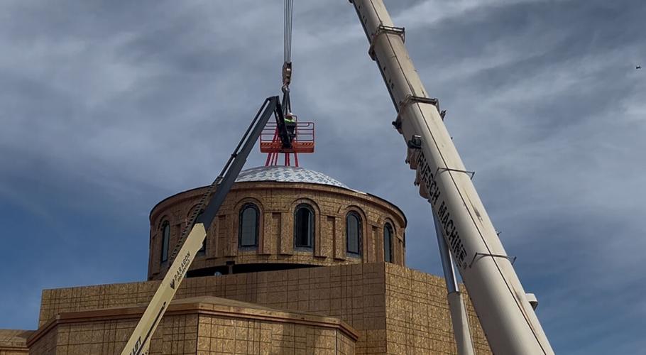 Hundreds gather as 30,000-pound dome lifted atop new Orthodox church in ...