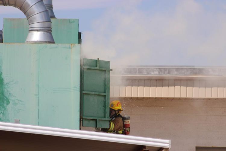 Firefighters battle smoldering blaze for hours in triple-digit ...