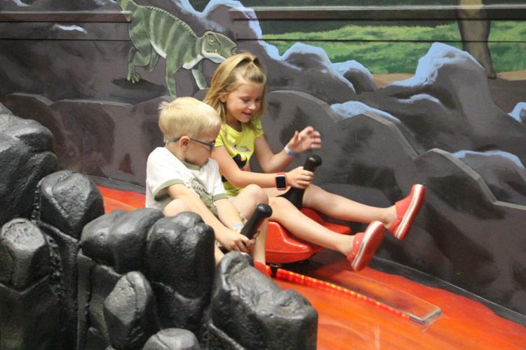 Dinosaurs roam the earth at new children’s museum exhibit | Arts ...
