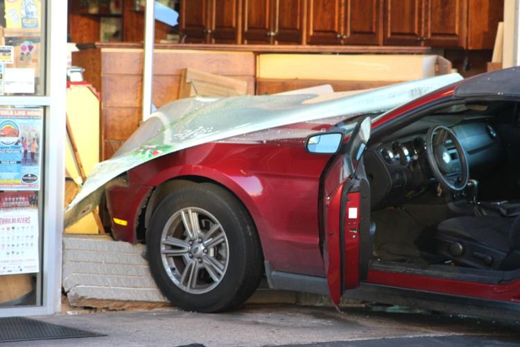 Mustang crashes into Stapley Pharmacy within feet of 3 employees ...
