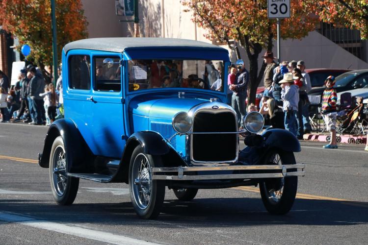 Hundreds of sheep parade down Cedar’s Main Street during livestock ...