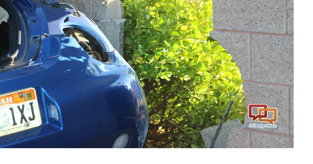 2-vehicle crash ends with Volkswagen Beetle smashed into retaining wall ...