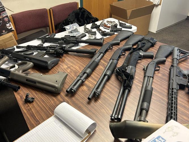 2 suspected drug dealers arrested in Cedar City raid; dozens of guns ...