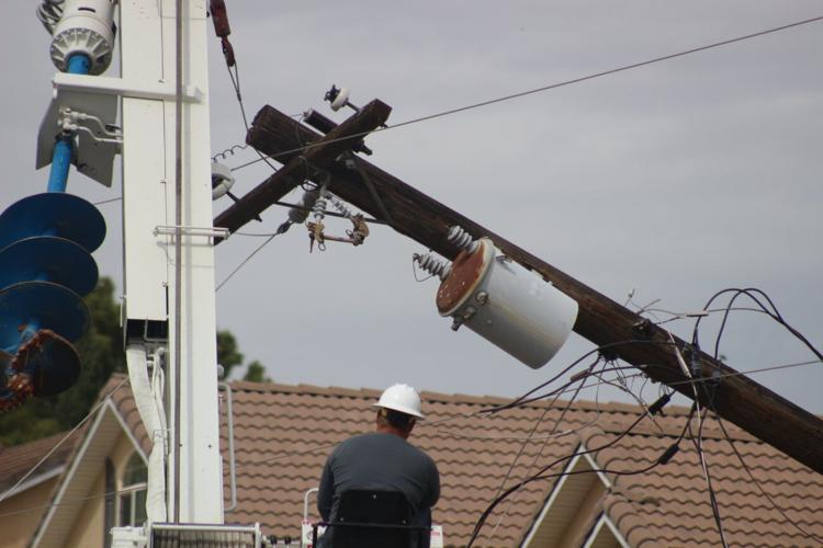 Downed power poles cause outage in Washington City | Local News ...
