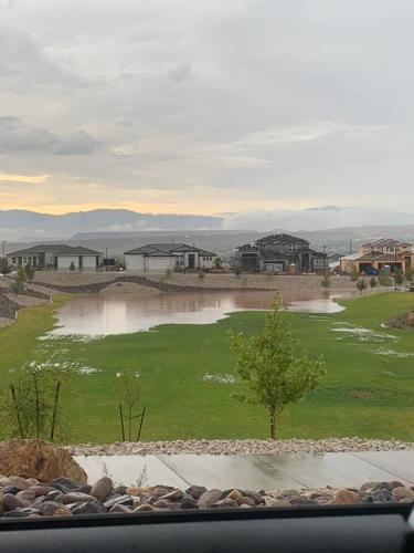 Photo gallery: Afternoon thunderstorms bring dark skies, flooding to ...