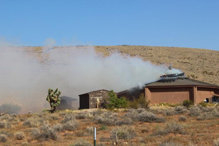 Front-end loader extinguishes fire at abandoned visitor center | Local ...