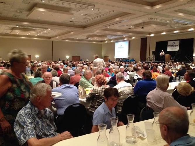 Small vocal group protests at Dixie Power meeting | Business ...