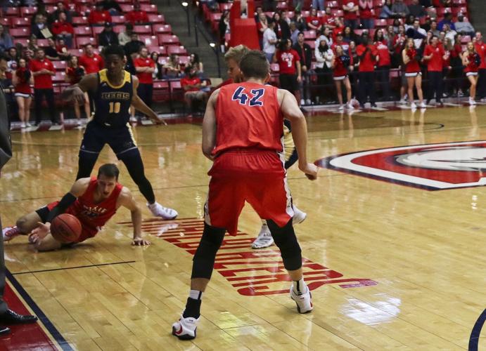 Dixie State basketball teams split night against Regis | Local News ...
