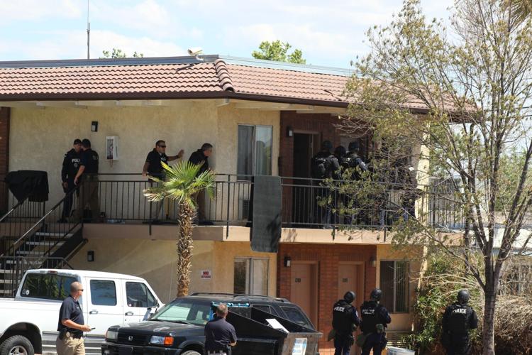 UPDATED: SWAT team raids barricaded hotel room | Local News ...
