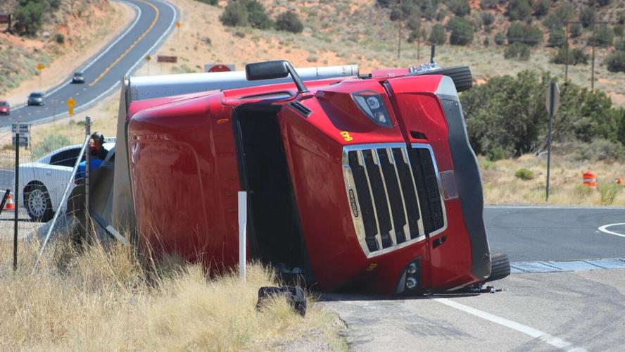 Semi carrying 77,000 pounds of Coca-Cola tips over after driver tries ...