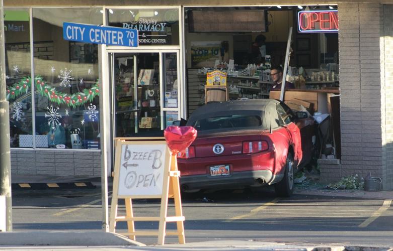 Mustang crashes into Stapley Pharmacy within feet of 3 employees ...