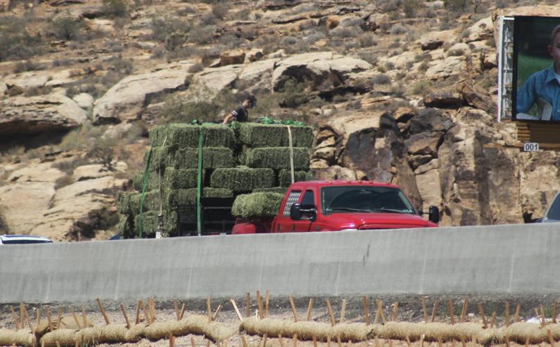 Drivers swerve around ‘big puff of green and hay’ as bales spill onto I ...