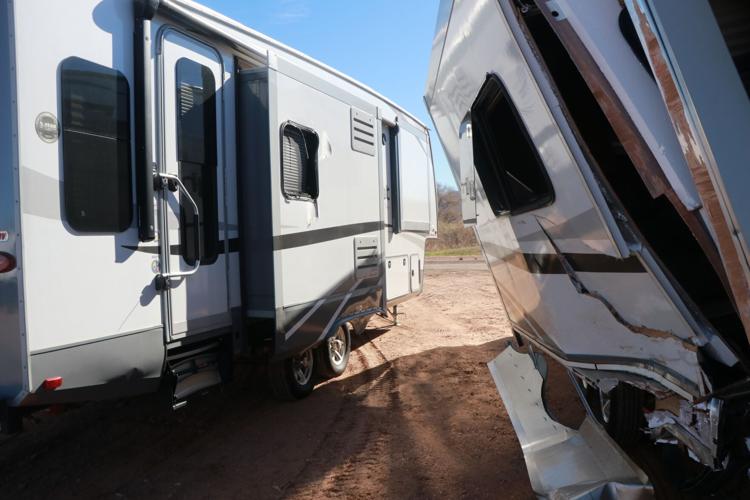 Driver arrested on suspicion of DUI after crashing into trailers at ...