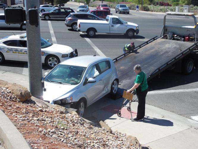 Left-turn collision sends car careening into light pole | Local News ...