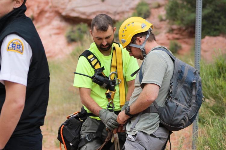 Trapped climber sleeps at edge of 600-foot cliff overnight | Local News ...