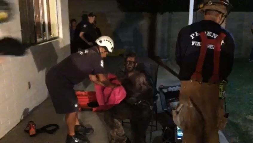Man rescued from chimney after getting stuck trying to enter home ...