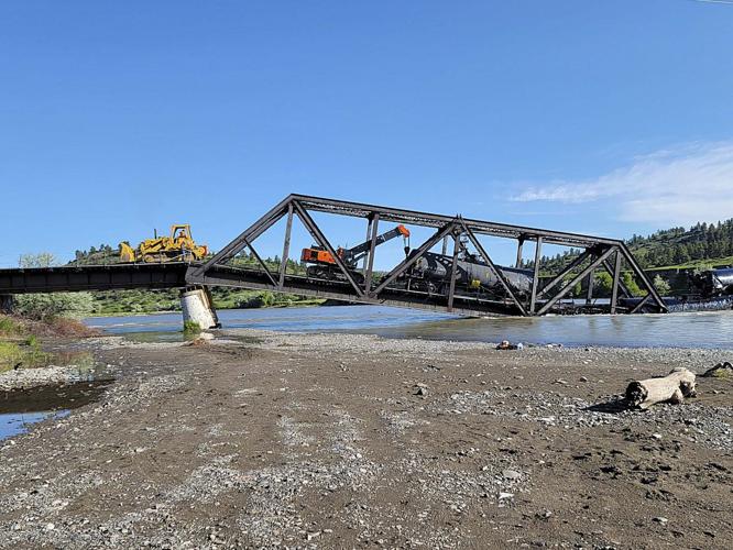 1 rail car remaining in the river, bird found dead stuck in asphalt ...