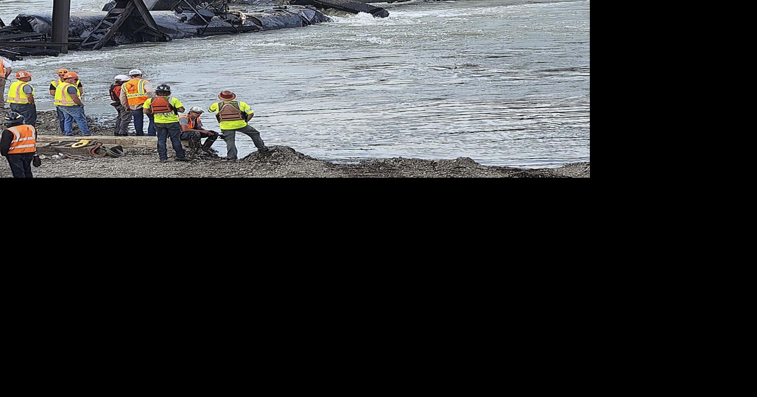 1 rail car remaining in the river, bird found dead stuck in asphalt ...