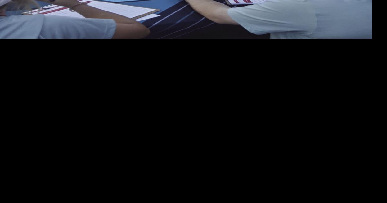 Students pick up backpacks, information during giveaway | Community ...